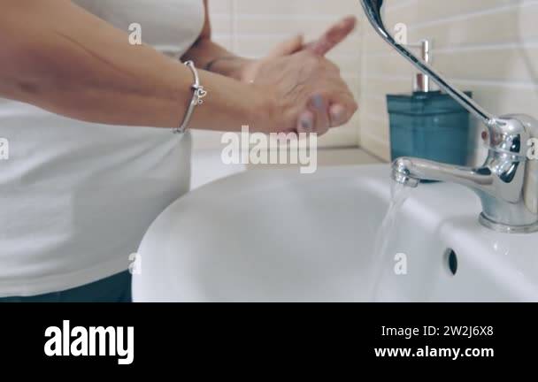Female lab worker washes hands Stock Videos & Footage - HD and 4K Video ...