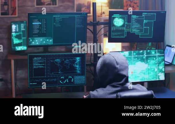 Back view of cyber terrorist using supercomputer Stock Video Footage ...