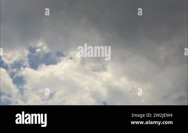 PUFFY CLOUDS, Puffy fluffy white clouds blue sky time lapse motion background. Bright blue sky ...