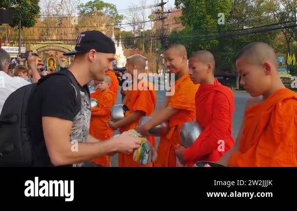 Chiang Mai, Thailand - March 21, 2019: Shaved Thai monks praying and ...