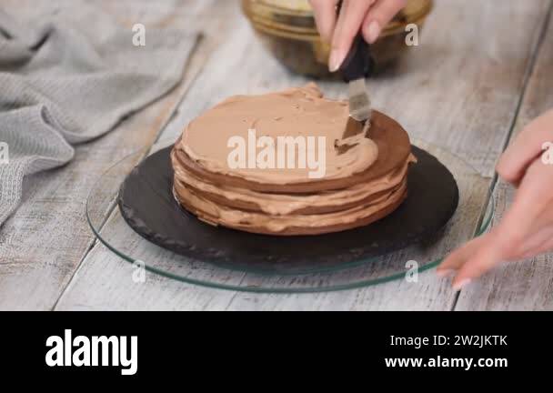 Step By Step. Pastry Chef Making Chocolate Layer Cake With Prune ...