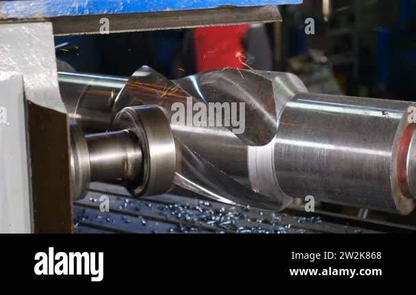 Metal grinding machine with sparks and swarfs. Oil and Gas Industry ...