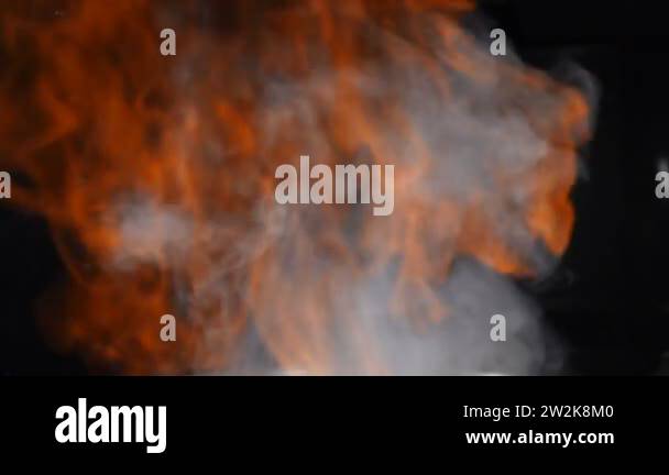 Fire Flames Igniting And Burning on black background while cooking ...