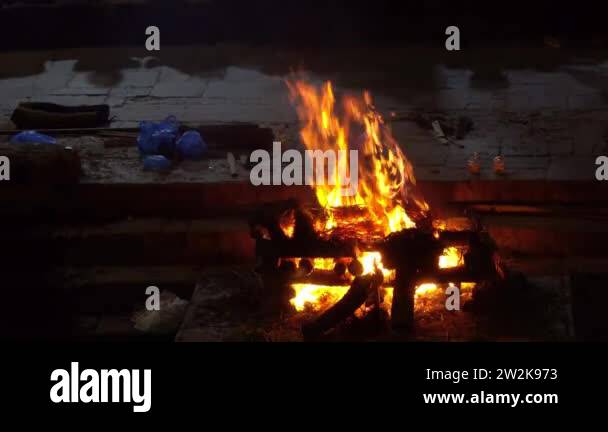 CLOSE UP: Fire burning during religious cremation ritual in ...
