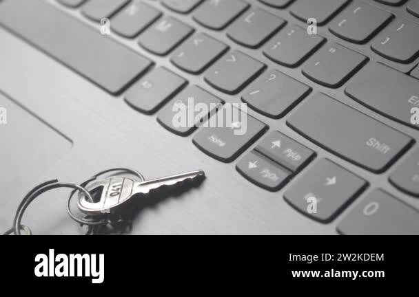 Close up of Still life of Key Ring on laptop computer keyboard ...