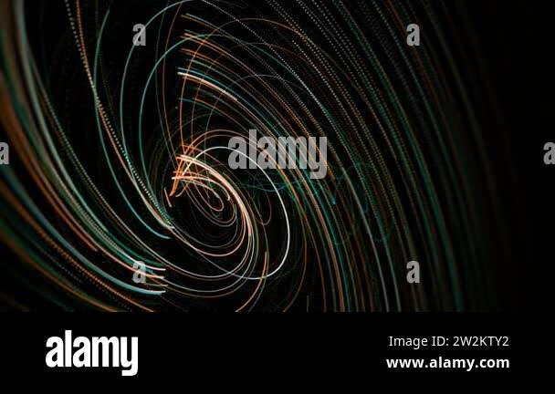 Swirling swirl of neon lines on black background. Animation. Swirl of ...