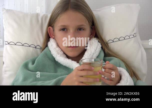 Sick Child Drinking Tea, Ill Kid in Bed, Blonde Girl Suffering from ...
