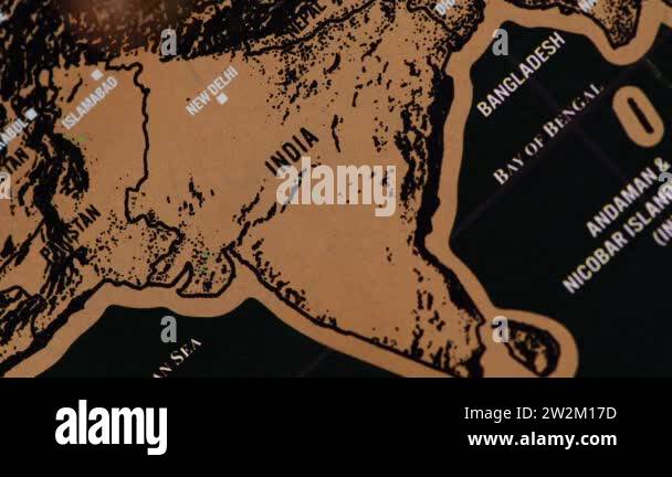 one dollar coin on black scratch travel map of India, New Delhi Stock ...