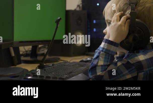 Serious Little Child Studying Learning Watching Internet Videos. Boy ...