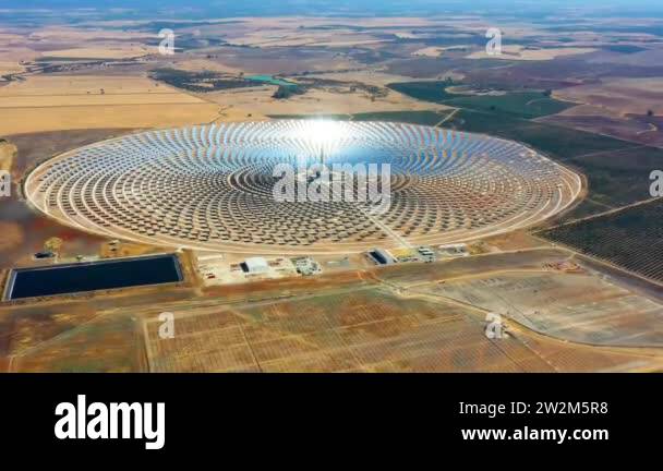 Modern solar power station with tower in aerial view, Concentrated ...