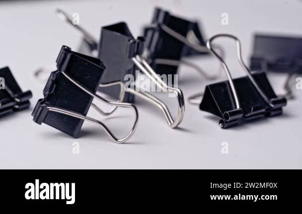 Binder clips Stock Videos & Footage - HD and 4K Video Clips - Alamy