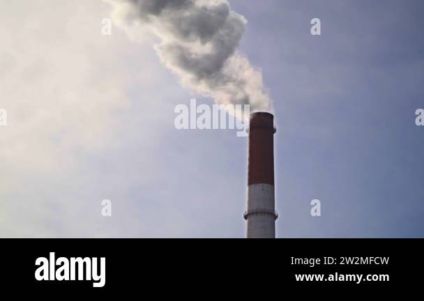 Pipes with smoke: industrial production, plant, air pollution. Dense ...