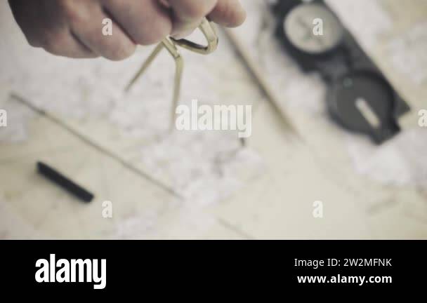 Captain planning a route on a map for his next cruise Stock Video ...