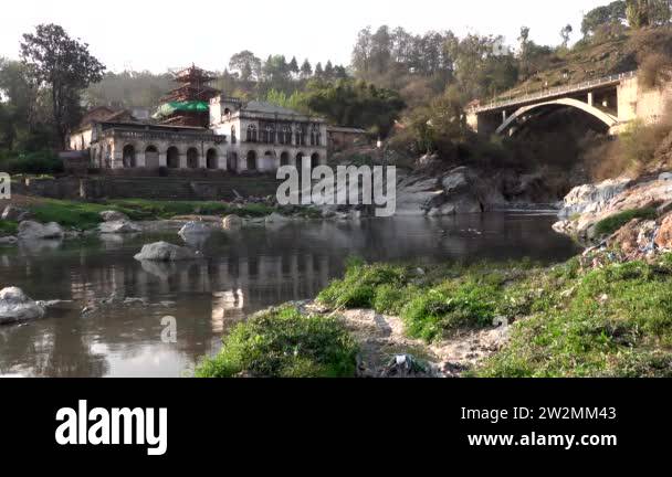 A Hindu Temple along the Polluted Bagmati River in Nepal Stock Video ...