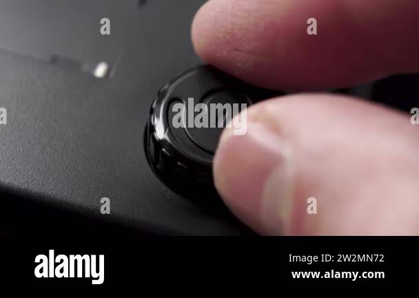 Regulation of the power of the lighting device by turning the knob with ...