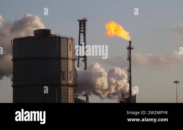 Waste gas flare at a coke oven plant in the UK Stock Video Footage - Alamy