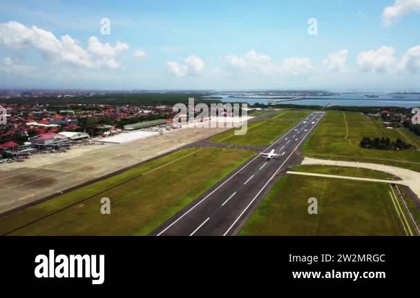 Airplane running on the runway and take-off - view from plane window ...