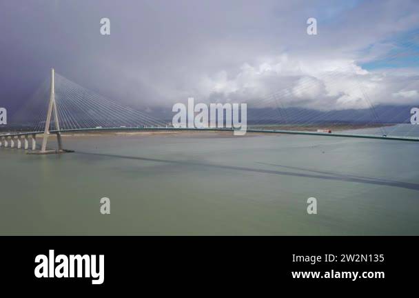 Flowing road traffic on a European motorway bridge. Pont de Normandy, a ...