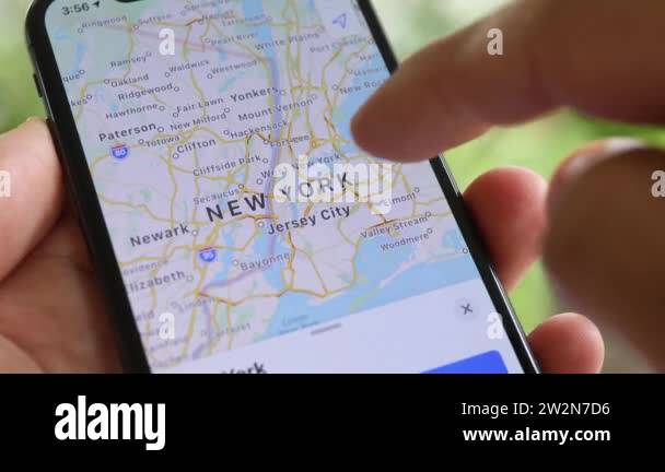 Man using navigation application with his phone and searching for ...