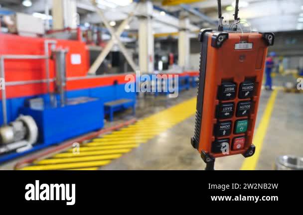 Control console of lifting crane for heavy details shot on factory ...