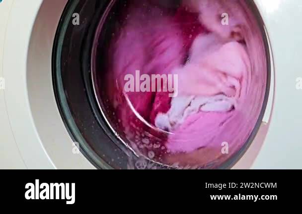 rotation of the Laundry drum of an industrial automatic washing machine ...