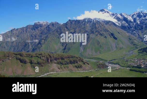 The village of Stepantsminda in the Kazbegi reserve is surrounded by ...