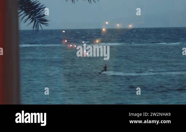 People Kite surfing in beautiful clear water in Dahab Egypt point of ...