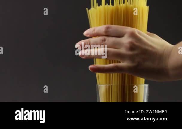 raw pasta spaghetti 4k isolated on black background rotating Stock ...