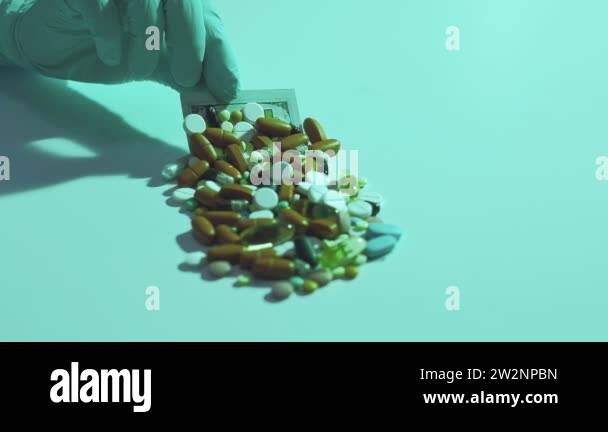 medical expenses doctor hand 100 dollar bill pill Stock Video Footage ...