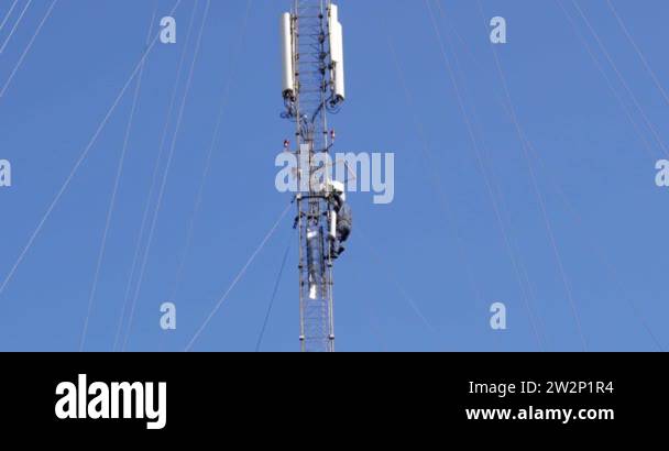 Closeup aerial shot around of telecommunication tower in a rural location. Telecom tower ...