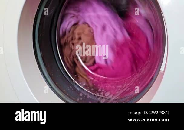 rotation of the Laundry drum of an industrial automatic washing machine ...