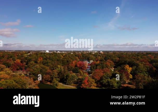 Beautiful autumn aerial lowering down over one of the lakes in Roger ...