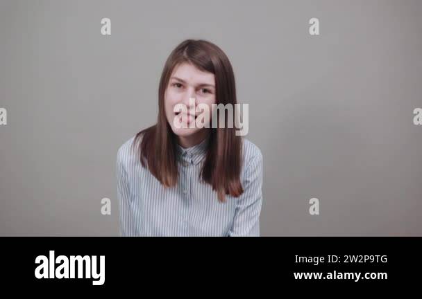 Fooling around outside, sticks out tongue as a sign of disobedience ...