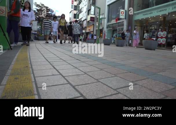Shoppers walk through pedestrian Stock Videos & Footage - HD and 4K ...