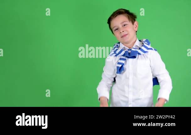 Young handsome child boy invites people - green screen - studio Stock ...