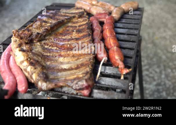4K Cooking barbecue with delicious sauce on grilled meat. Unhealthy ...