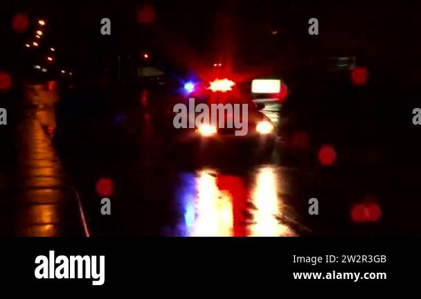 First police car arriving on scene of car crash an assessing driver ...