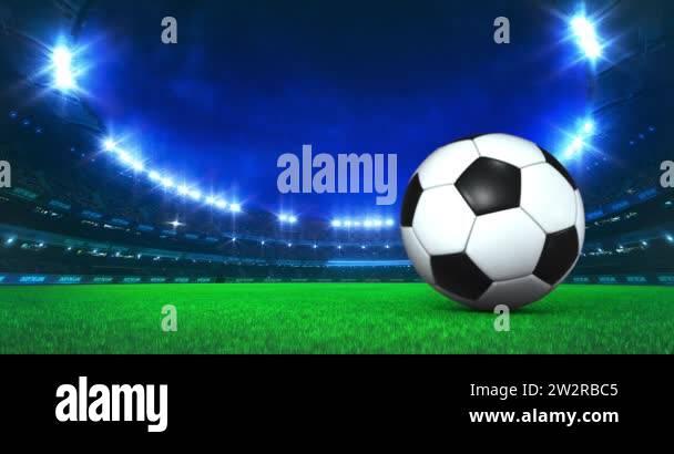 Modern Football and Soccer Stadium with shining lights and ball motion ...