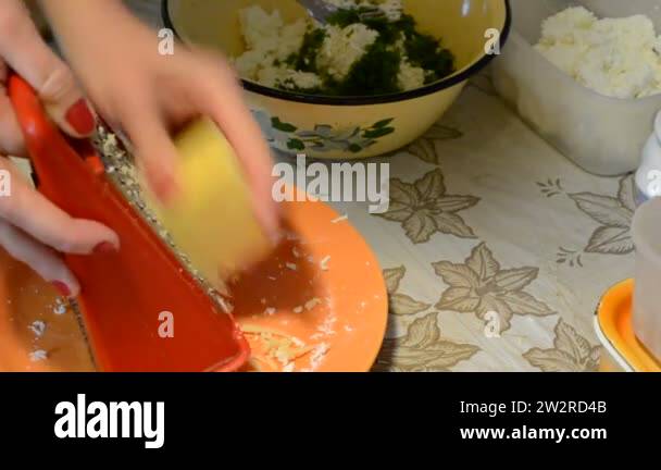 grating cheese.Cooking in kitchen Stock Video Footage - Alamy