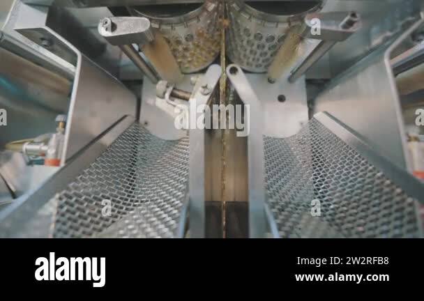 Conveyor line with tablets. The manufacturing process of drugs in a ...