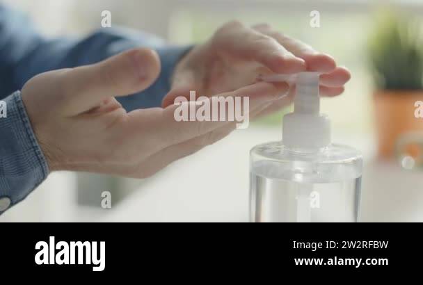 Man cleansing hands sanitizer Stock Videos & Footage - HD and 4K Video ...
