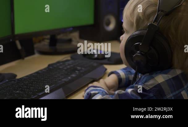 Serious Little Child Studying Learning Watching Internet Videos. Boy ...