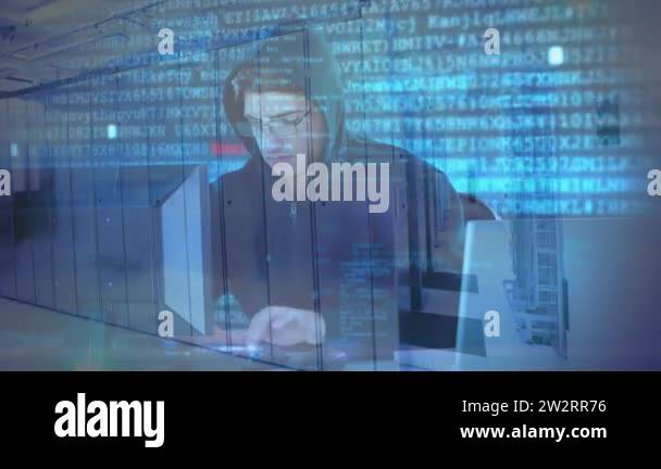 Animation of a hooded man hacking computer, data processing and digital information flowing ...