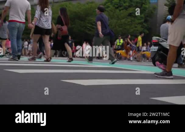 Taipei, Taiwan-13 August, 2017: 4K Crowd of pedestrian are crossing in ...