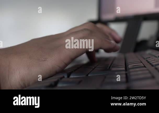 Fingers Typing At Desktop Computer Keyboard. Low Angle, Close Up ...