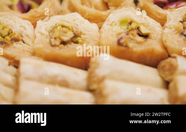 Assorted baklava. A Turkish sweet arranged on a rows. Middle eastern ...