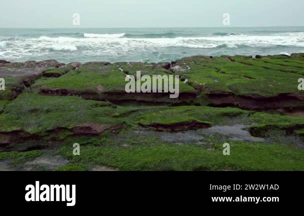 4K Laomei Green Reef New Taipei City. Sea waves breaking on coast ...