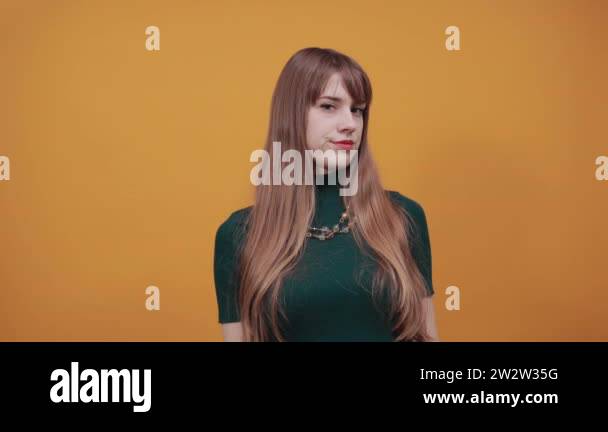 Pointing thumb over shoulder at blank space isolated. thumb aside Stock ...