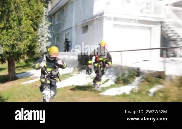 Fire crews house in Stock Videos & Footage - HD and 4K Video Clips - Alamy
