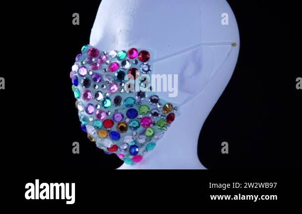 Mannequin wearing medical urban fashion luxury diamonds face mask and ...